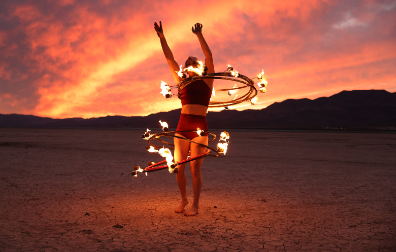 Most fire hoops spun simultaneously | Guinness World Records