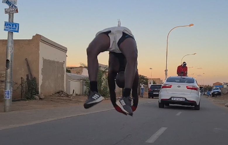 Most consecutive interlocked-hand back handsprings | Guinness World Records